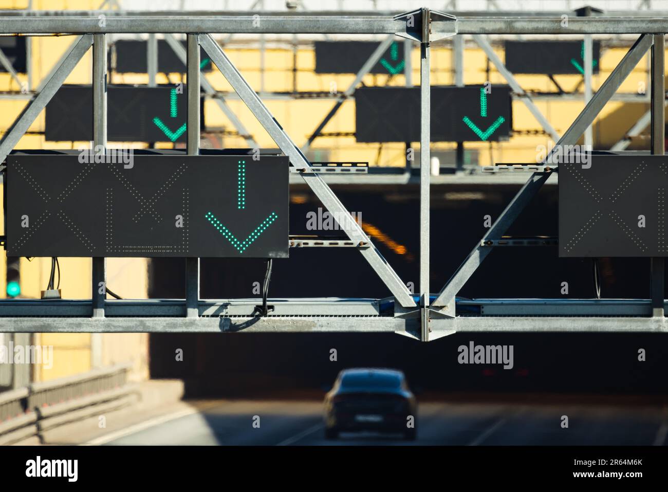 Illuminated traffic signs, traffic lanes arrows before entering the ...