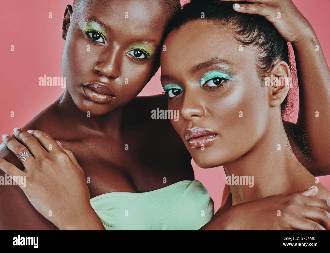 Women together, color makeup and art in studio portrait with beauty ...