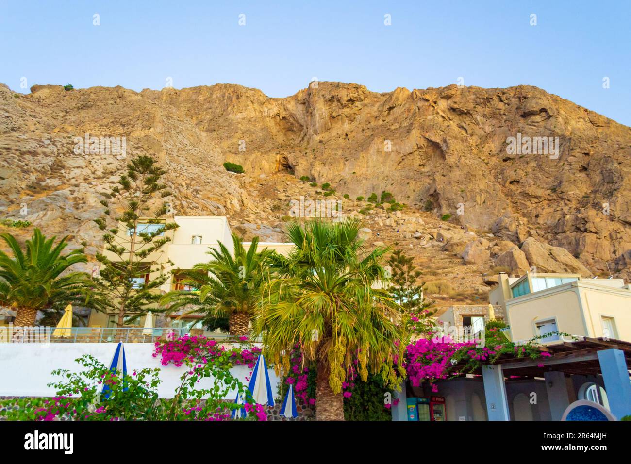Picturesque architecture of Kamari village at sunrise at the foot of ...