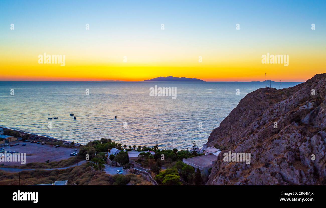 Sunrise over Aegean Sea,Anafi island in the distance and colorful dawn ...