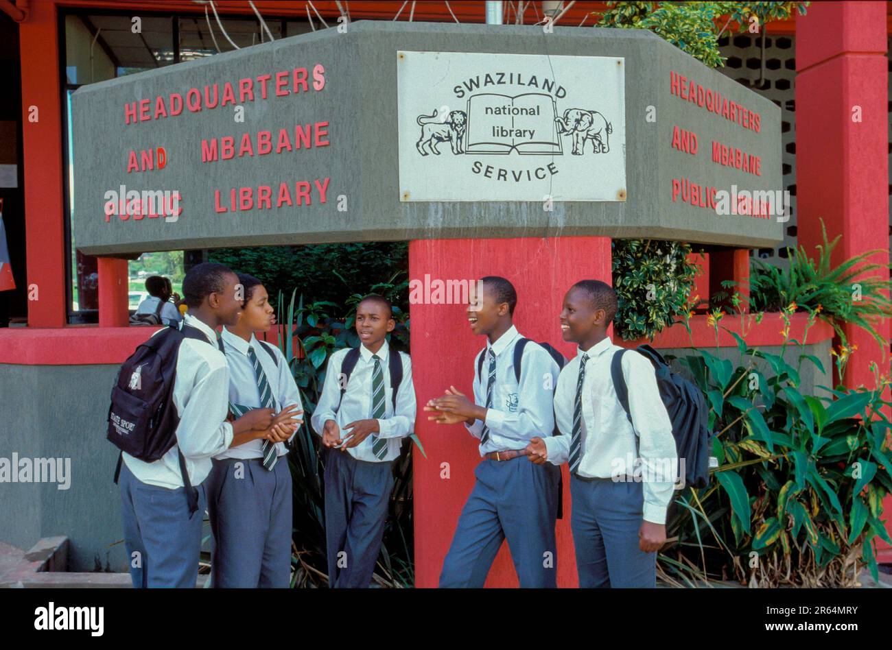 Swaziland, students in school uniform in front of the public library in ...