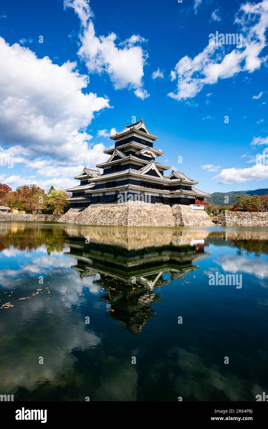 Matsumoto Castle tower reflected in the inner moat Stock Photo - Alamy