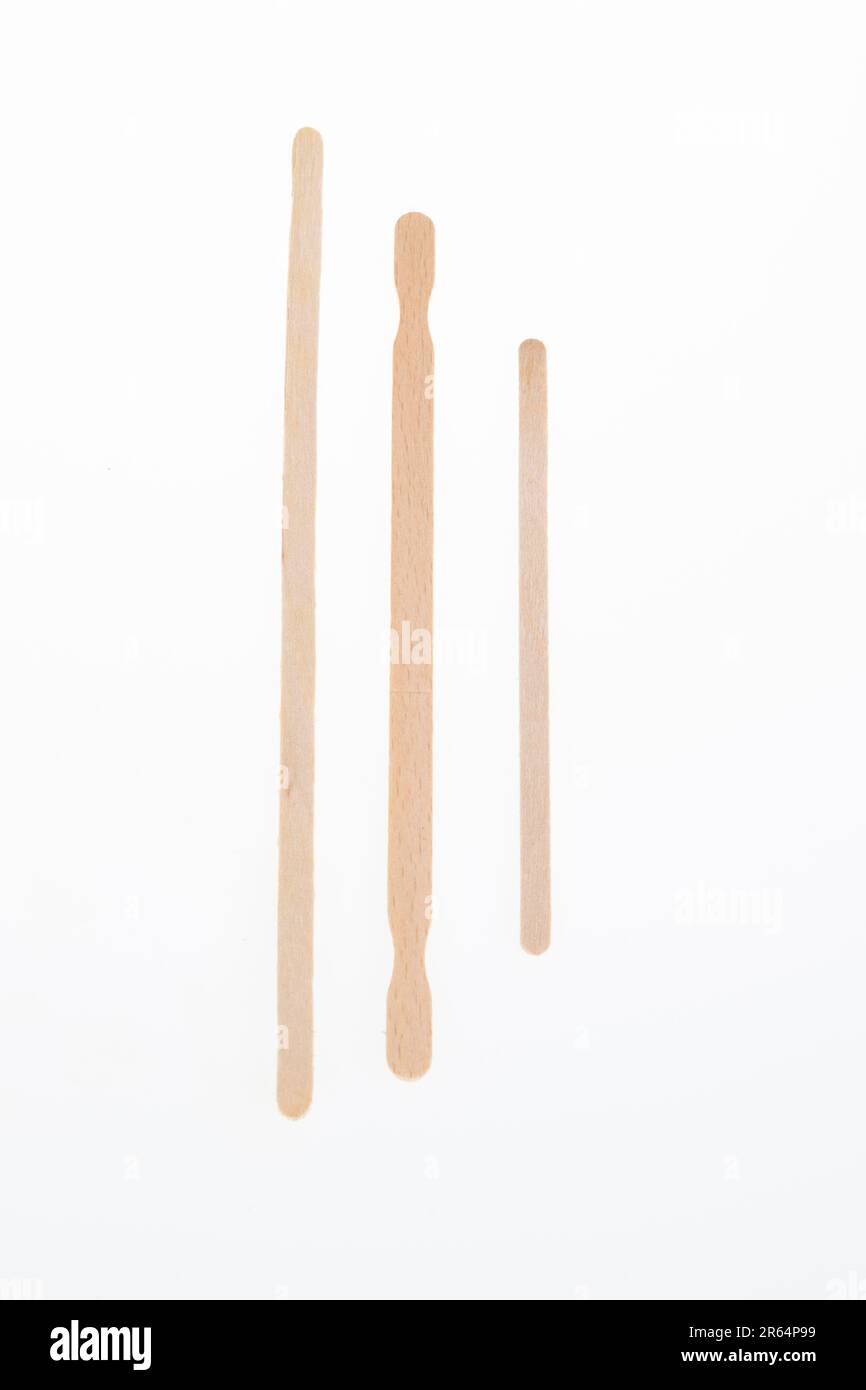Natural wooden stirrers toothpicks three wood piece isolated on white ...