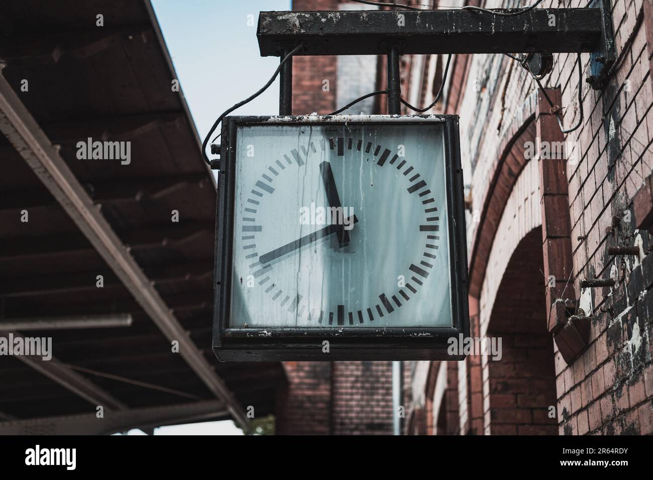 Old railway clock hanging hi-res stock photography and images - Alamy