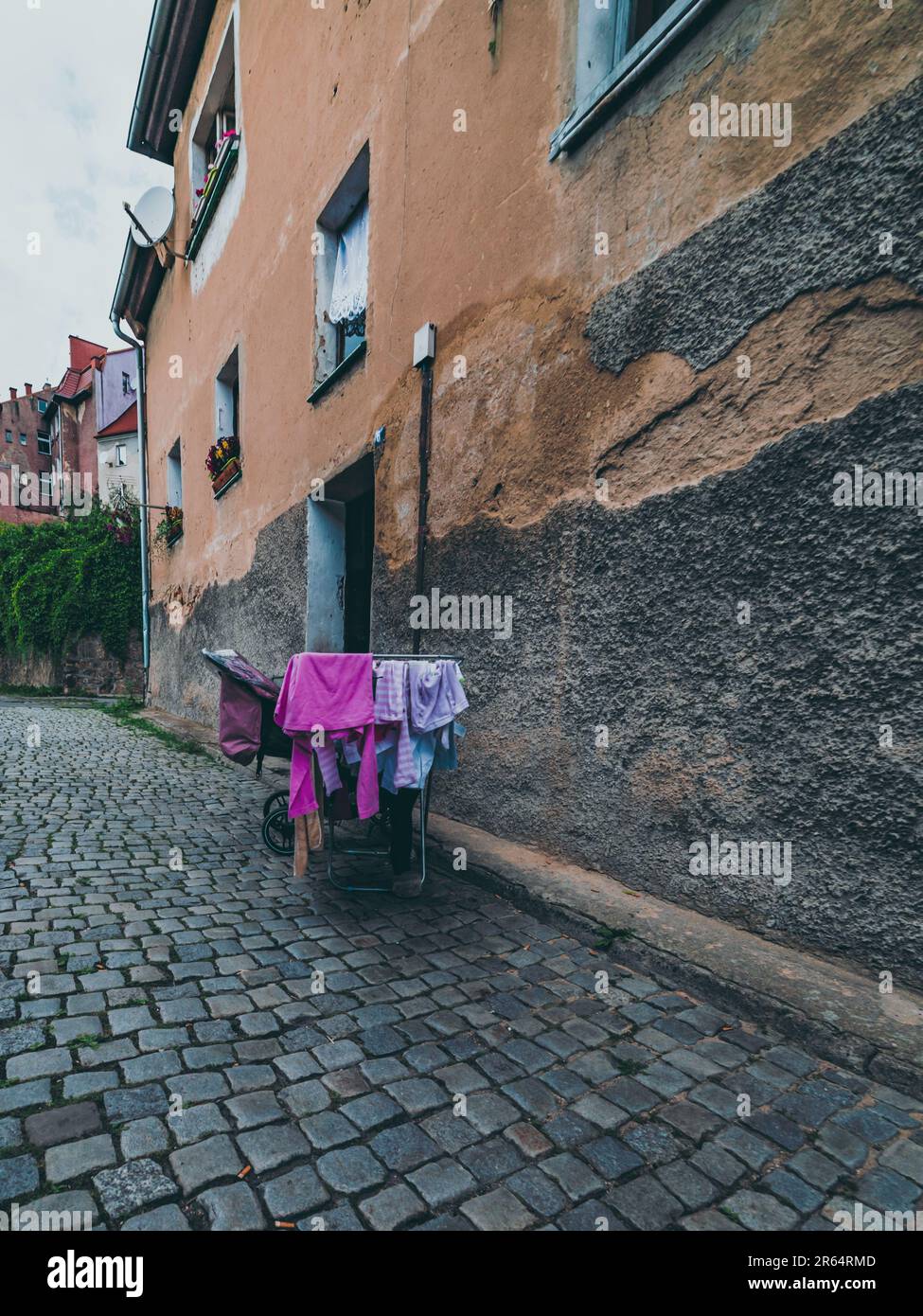 laundry hanging out in the street Stock Photo - Alamy
