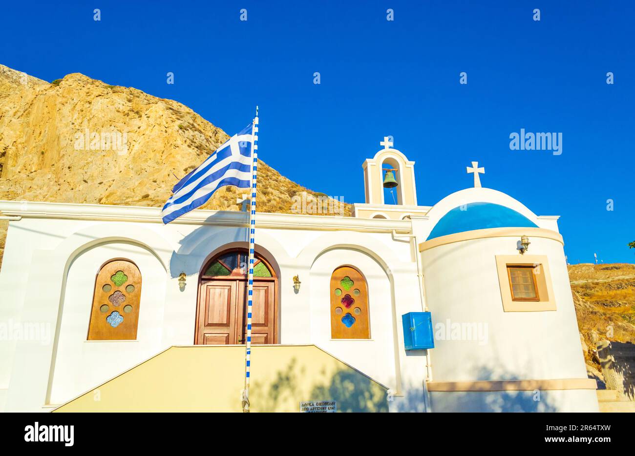Greek Orthodox church in the foot of Mesa Vouno mountain with Greek ...