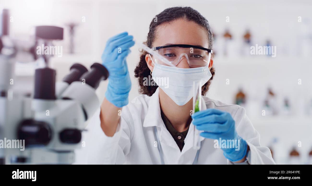 Herbal plant medicine, lab research and woman scientist with test tube ...