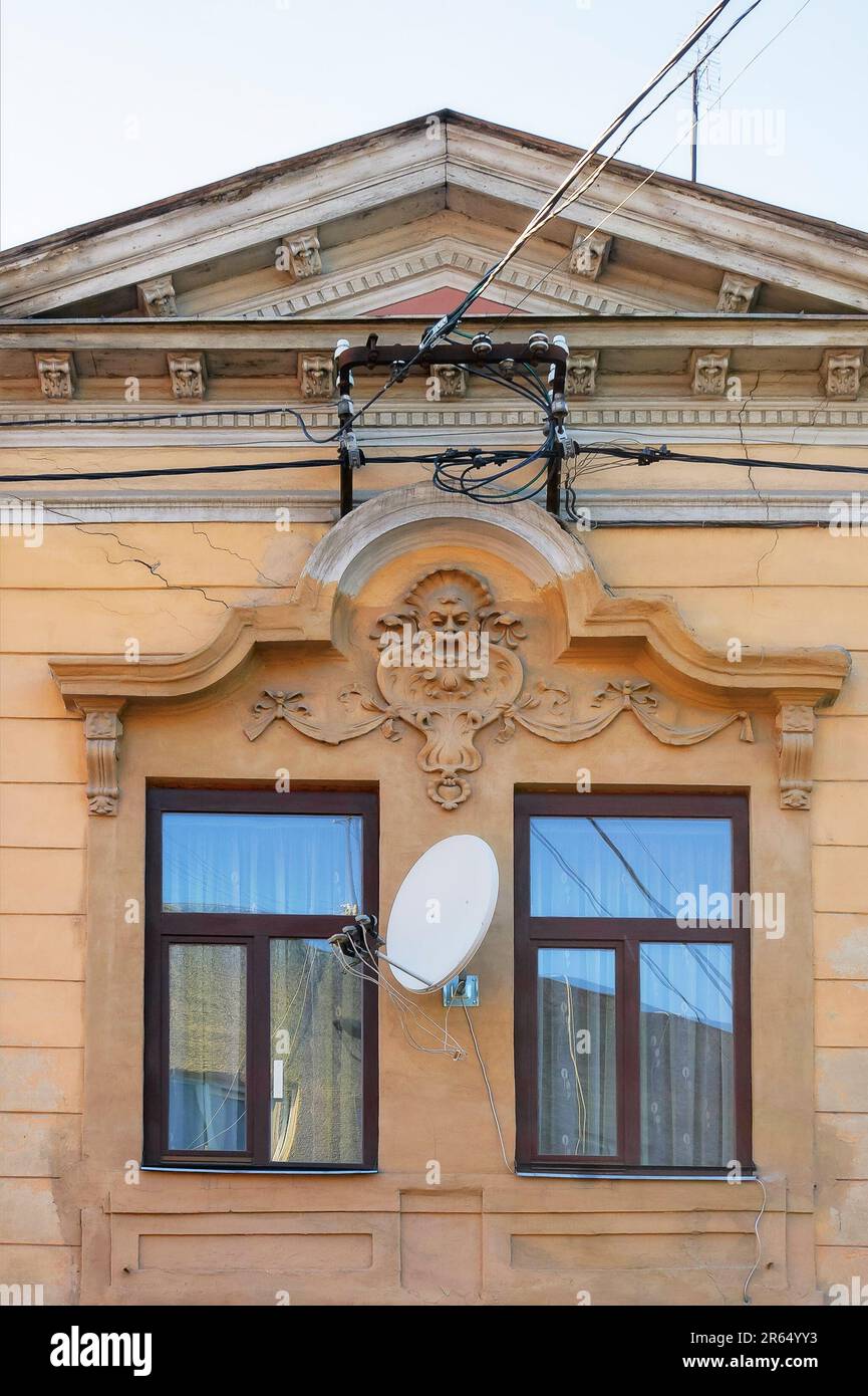ancient windows on the vintage wall. antique architectural element in ...