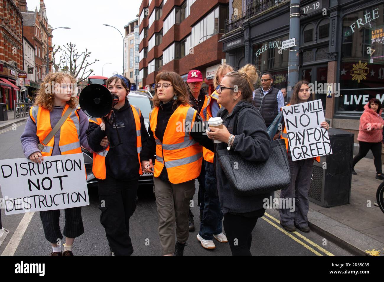 London, England, UK 7 June 2023 Angry woman, and other members of the ...