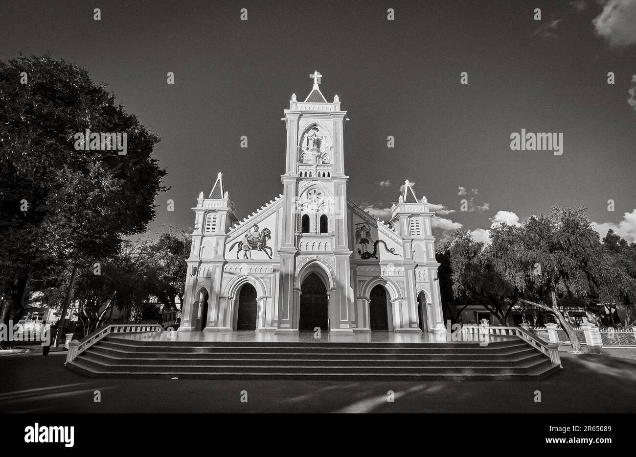 A front view of the yellow decorated Catholic Tan Huong Church, in ...