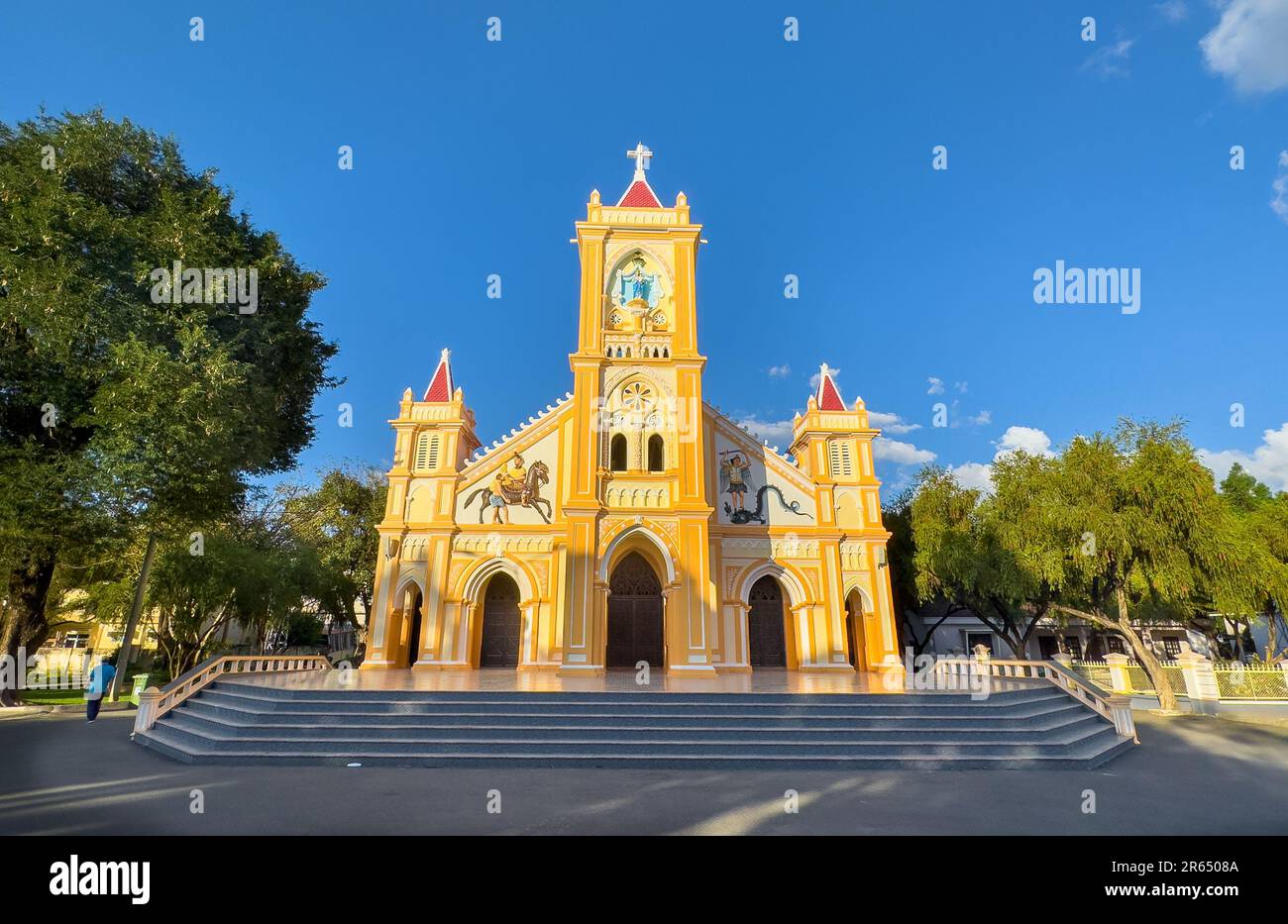 A front view of the yellow decorated Catholic Tan Huong Church, in ...