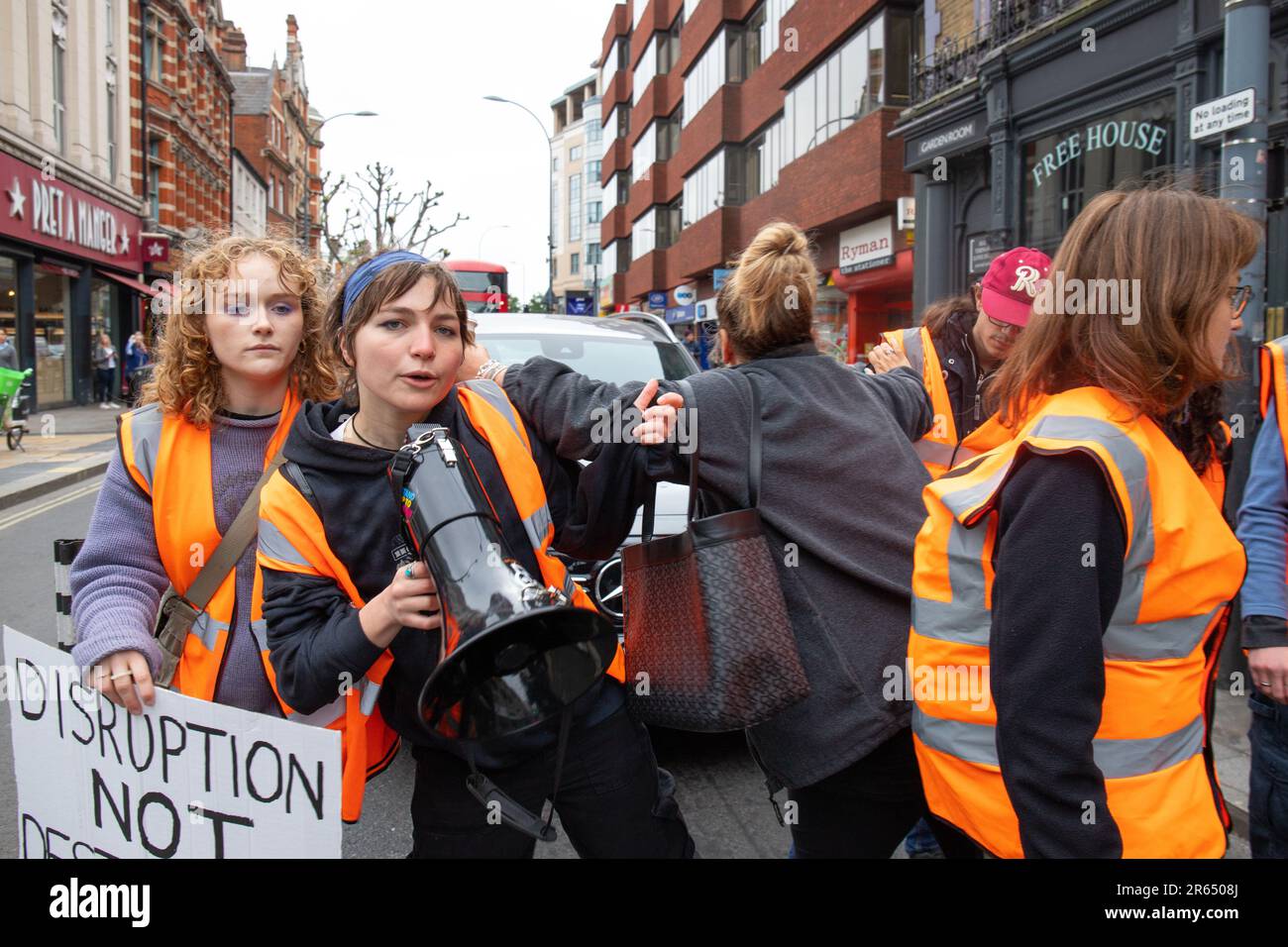 London, England, UK 7 June 2023 Angry woman, and other members of the ...