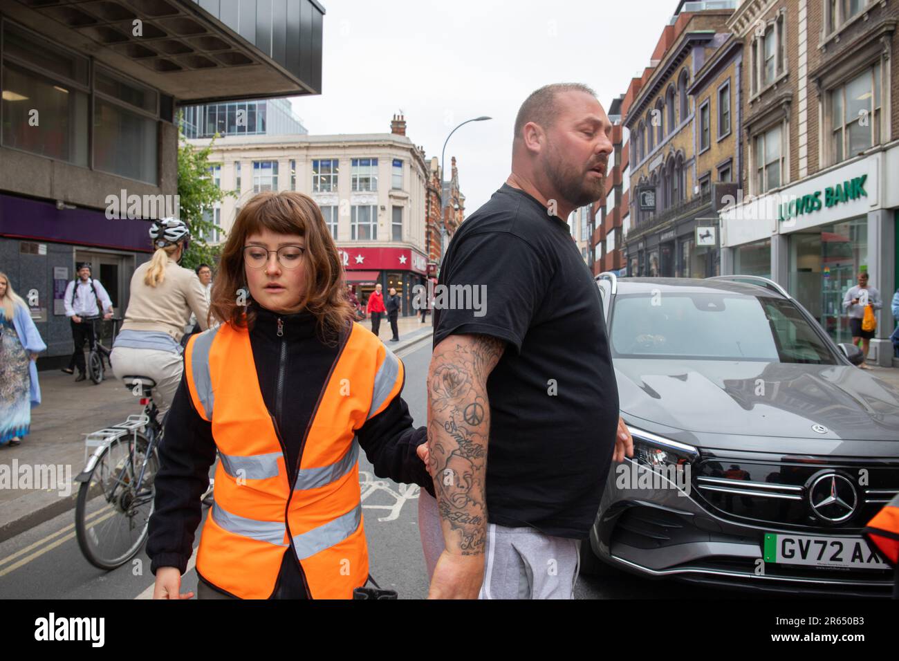 London, England, UK 7 June 2023 Angry woman, and other members of the ...