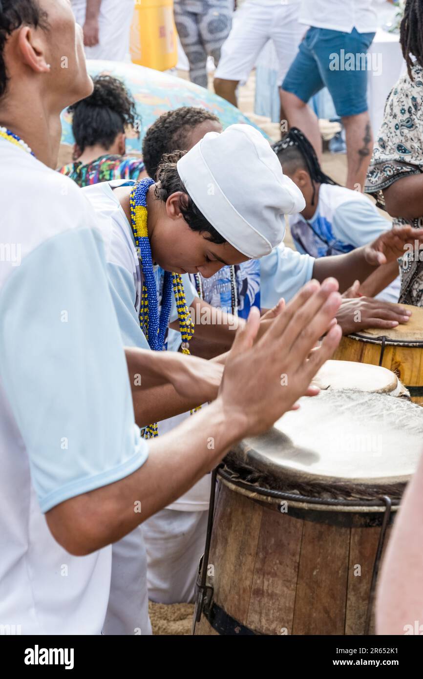 A group of people perform a musical piece together in an outdoor ...