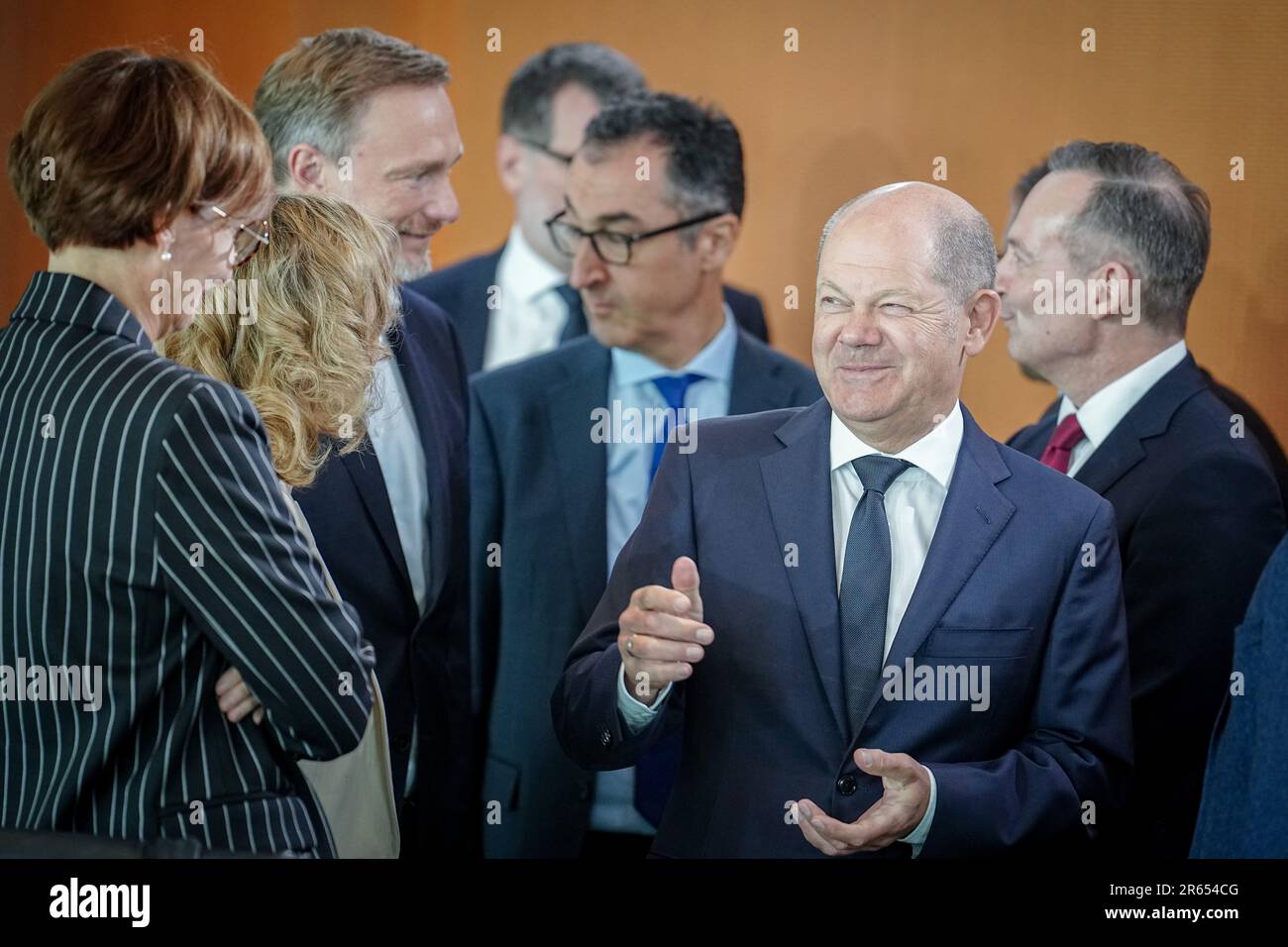 07 June 2023, Berlin: German Chancellor Olaf Scholz (2nd from.r, SPD) is joined by Bettina Stark ...