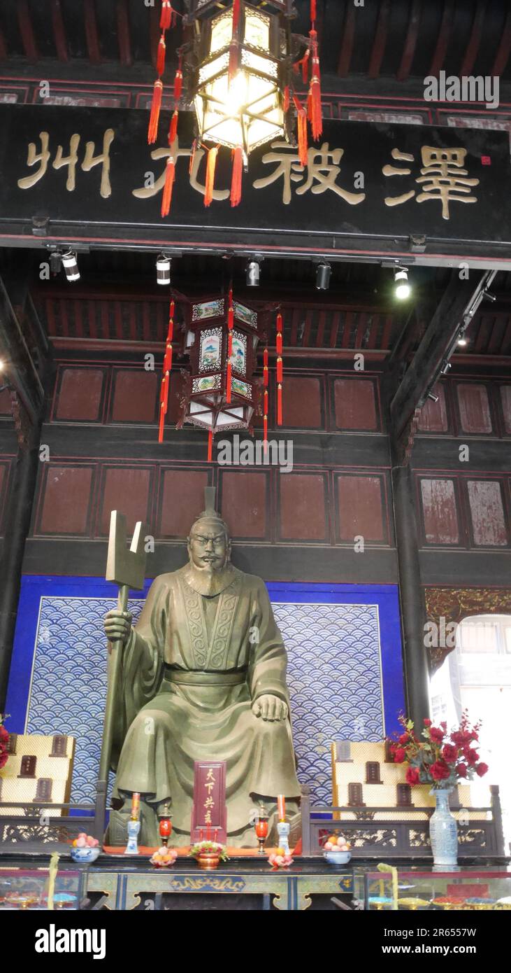 A large bronze statue of Yuwang Gong in a seated position Stock Photo ...