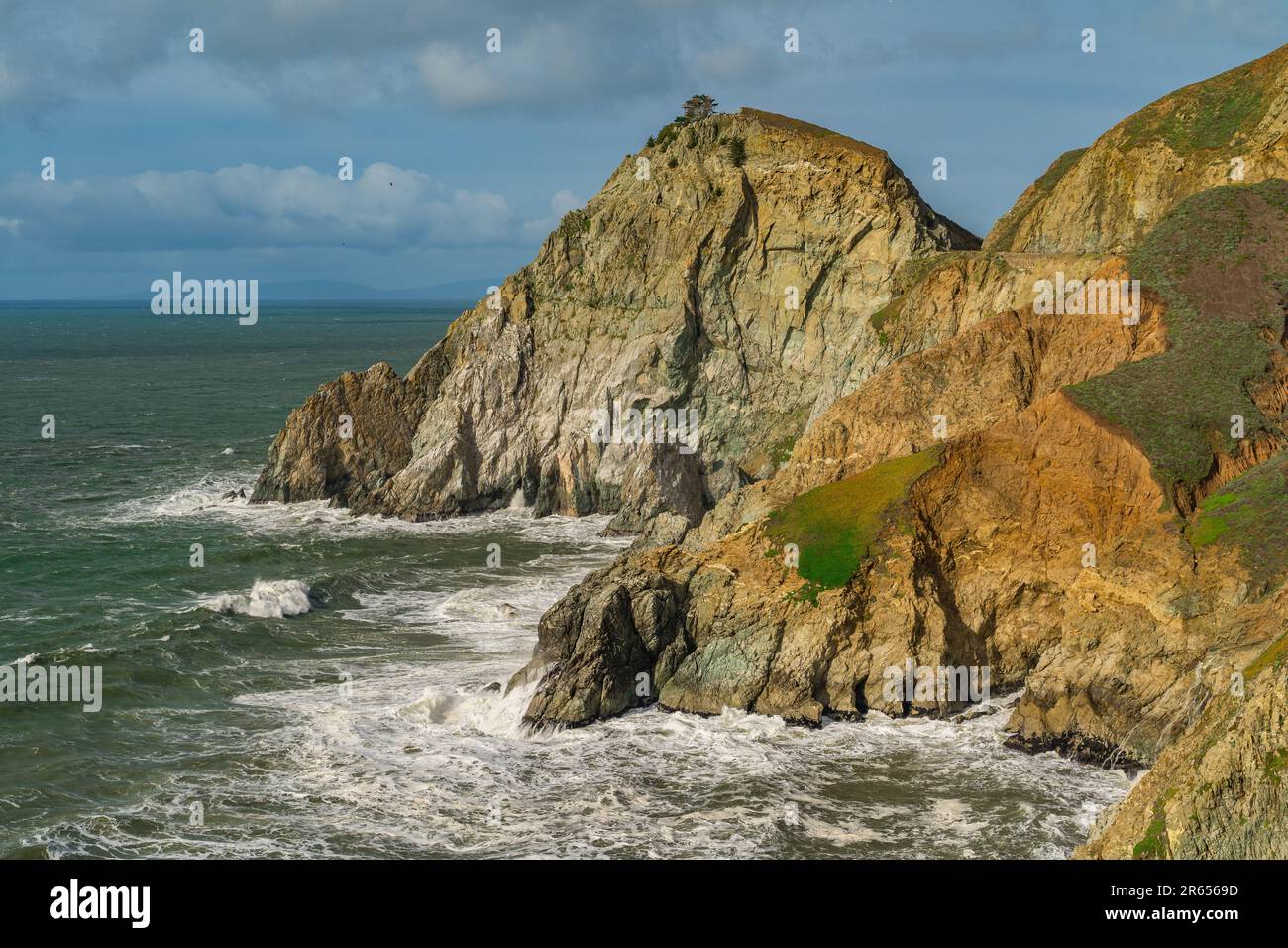 a breathtaking landscape of a coastal cliffside as a scene from the ...