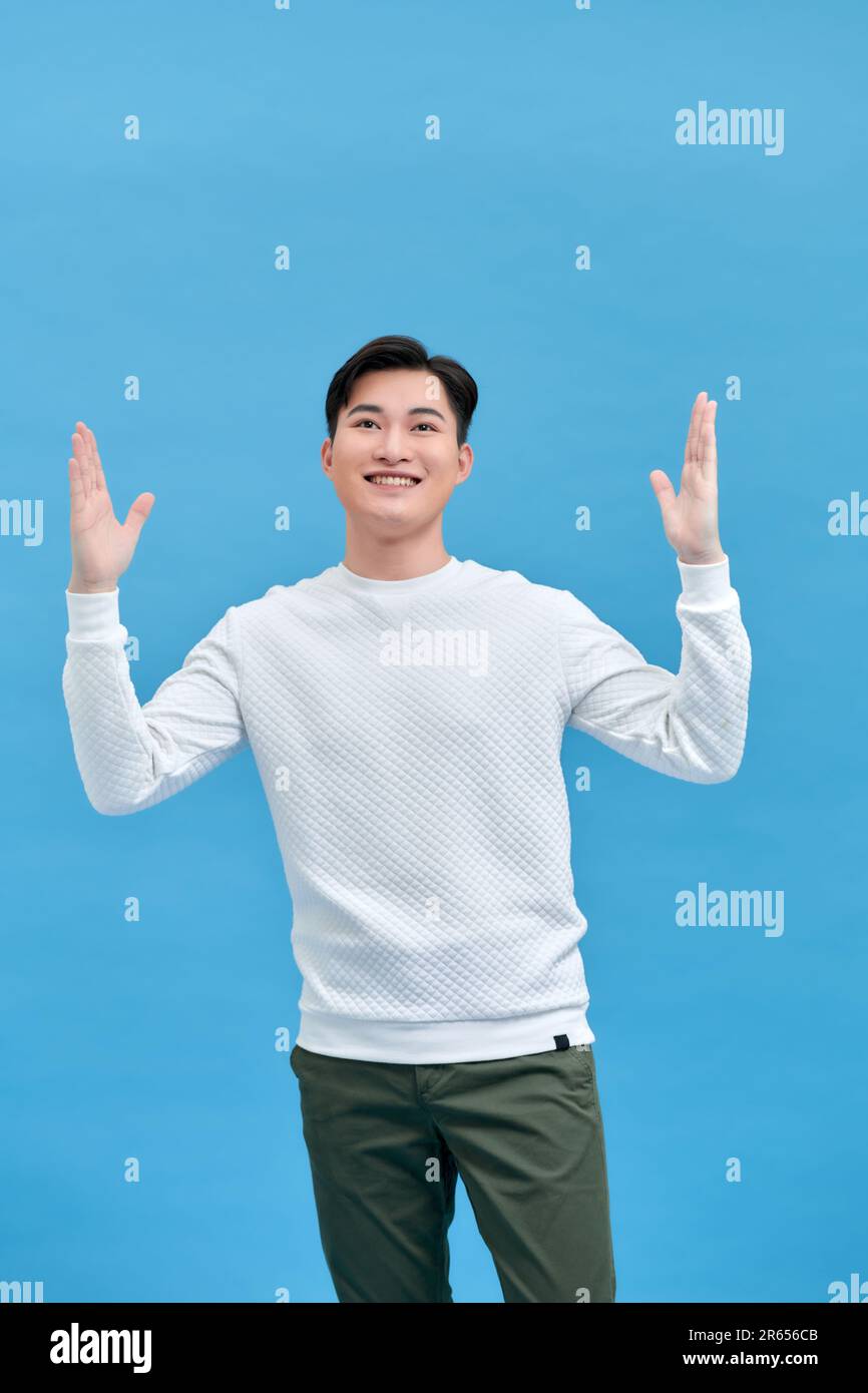 Young attractive handsome funny man excited fists up and celebrate ...