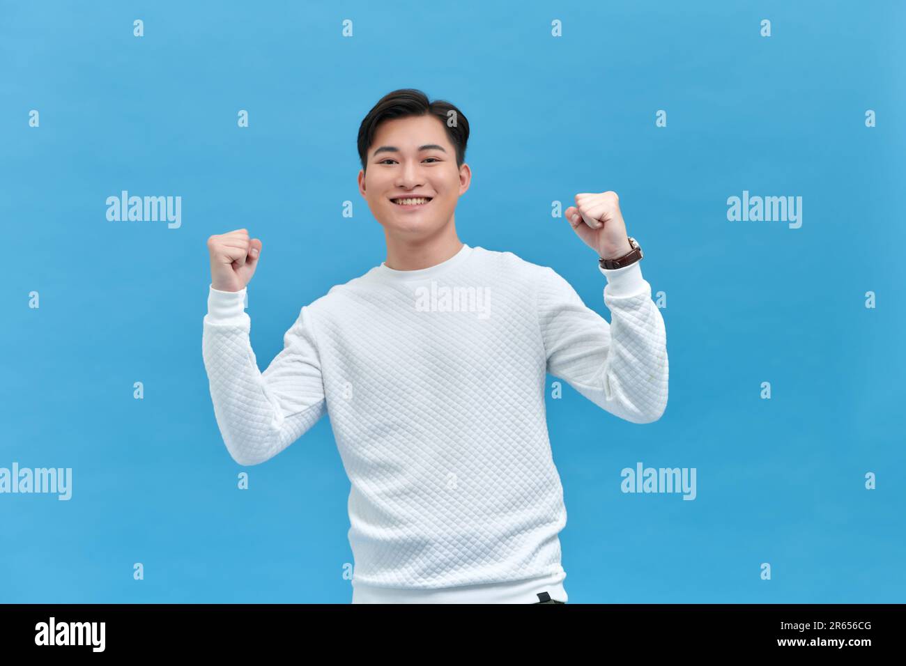 Man raised hands smile hi-res stock photography and images - Alamy
