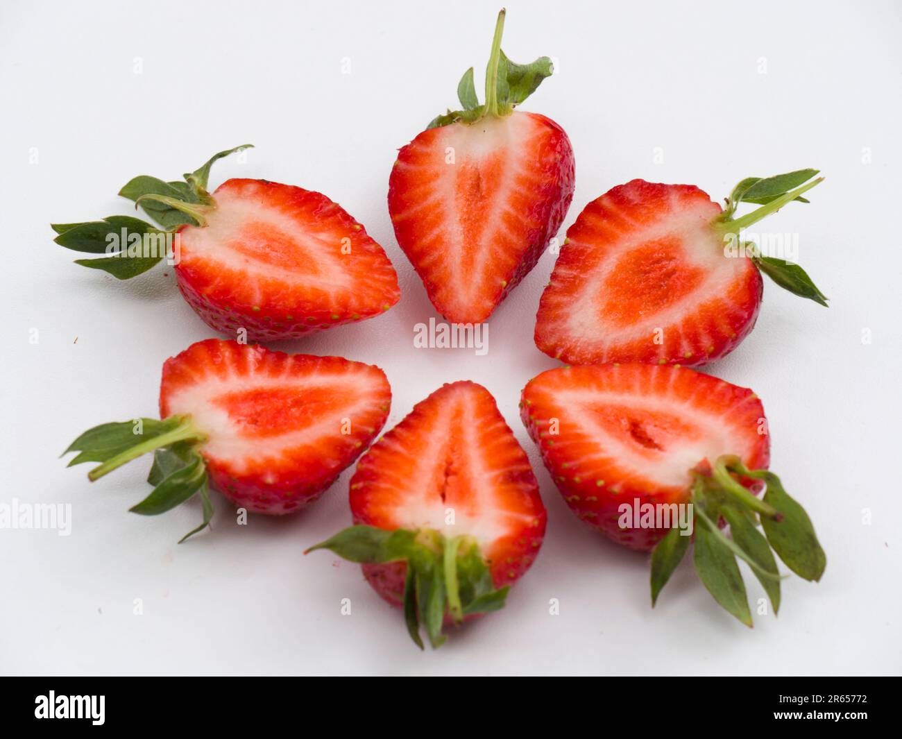 Strawberries halved hi-res stock photography and images - Alamy