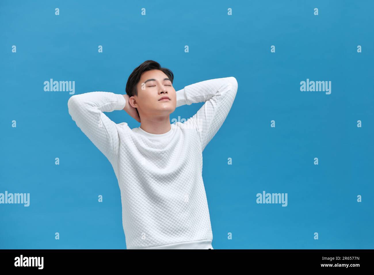 Hands behind back hi-res stock photography and images - Alamy