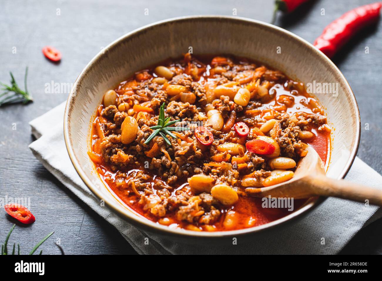 Chili Con Carne in bowl on dark background. Mexican cuisine. chili con ...