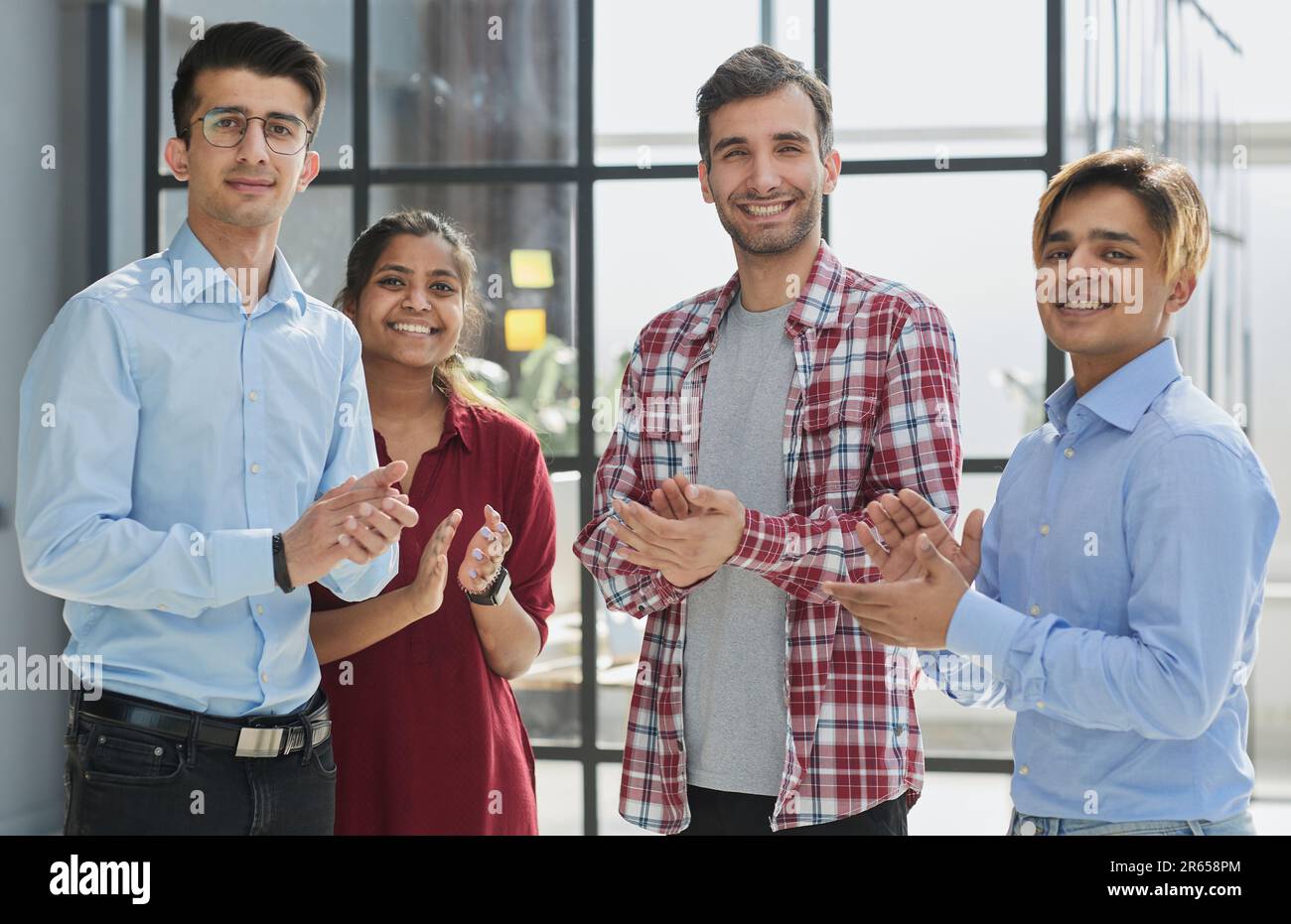 Successful business people celebrate together hi-res stock photography ...