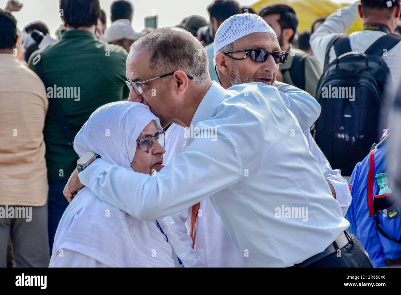 Srinagar, India. 07th June, 2023. A man gives a farewell hug to his ...
