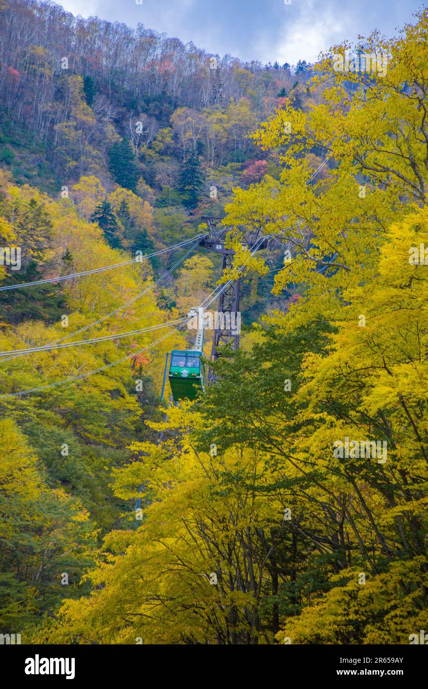 Kurodake ropeway and autumn leaves in Daisetsuzan Sounkyo Stock Photo ...