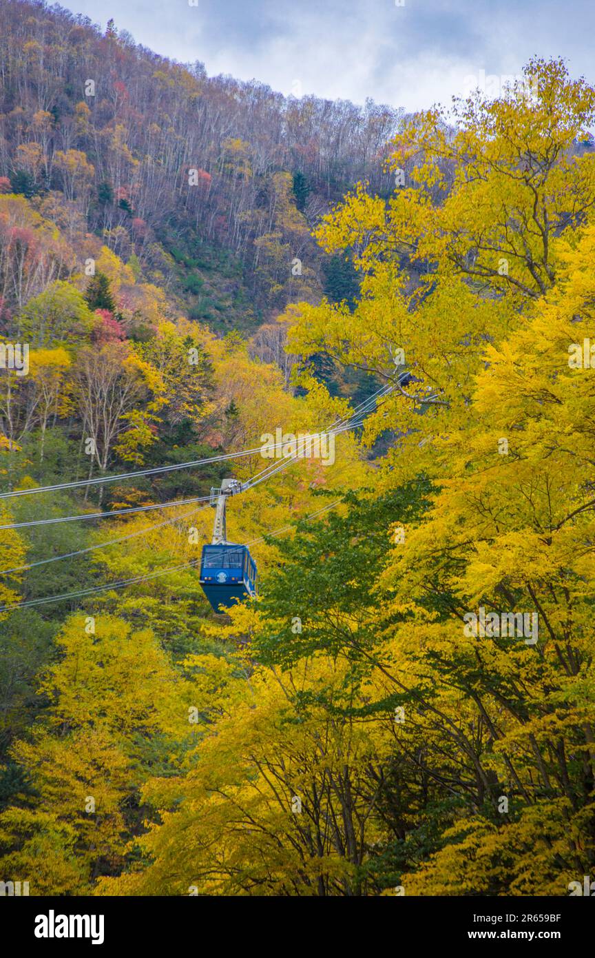 Kurodake ropeway and autumn leaves in Daisetsuzan Sounkyo Stock Photo ...