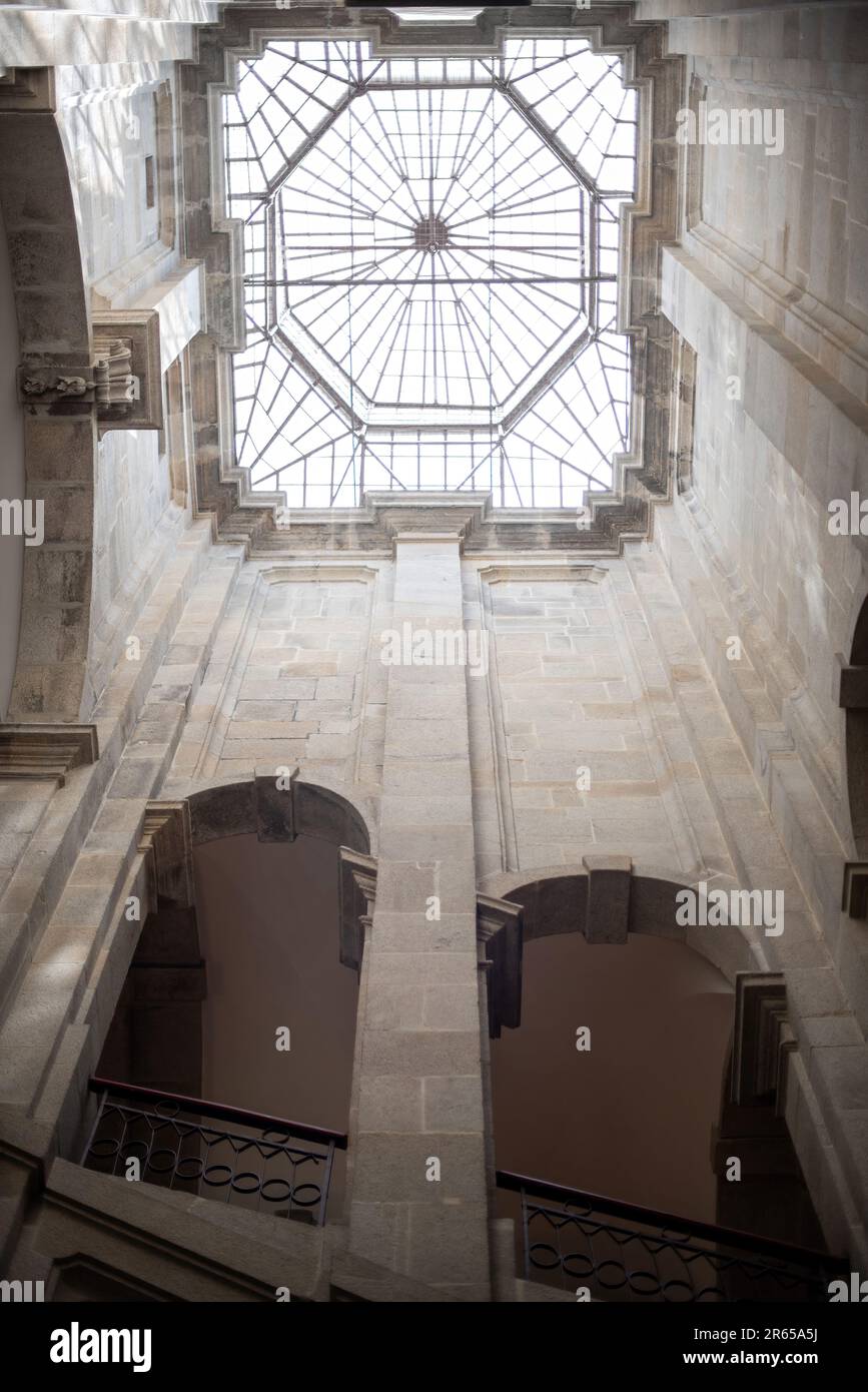 Glass roof of the hall in an old building with columns. View from ...