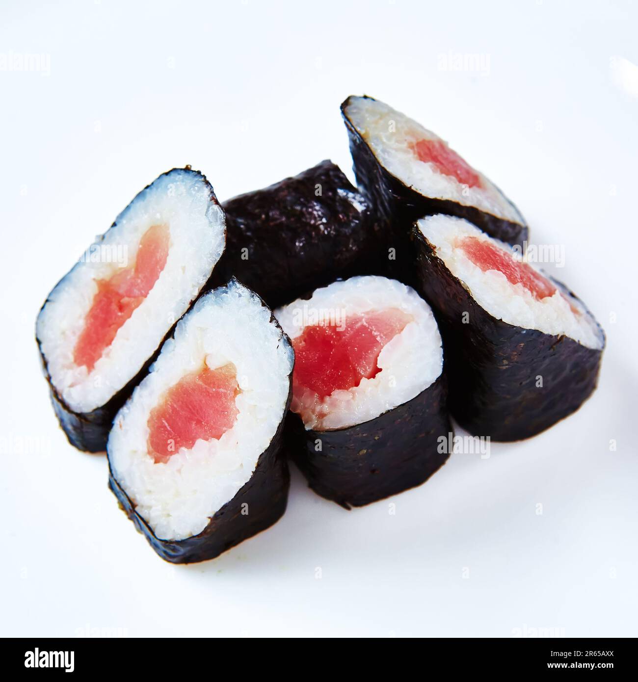 Traditional Japanese maki rolls with tuna on a white background Stock ...