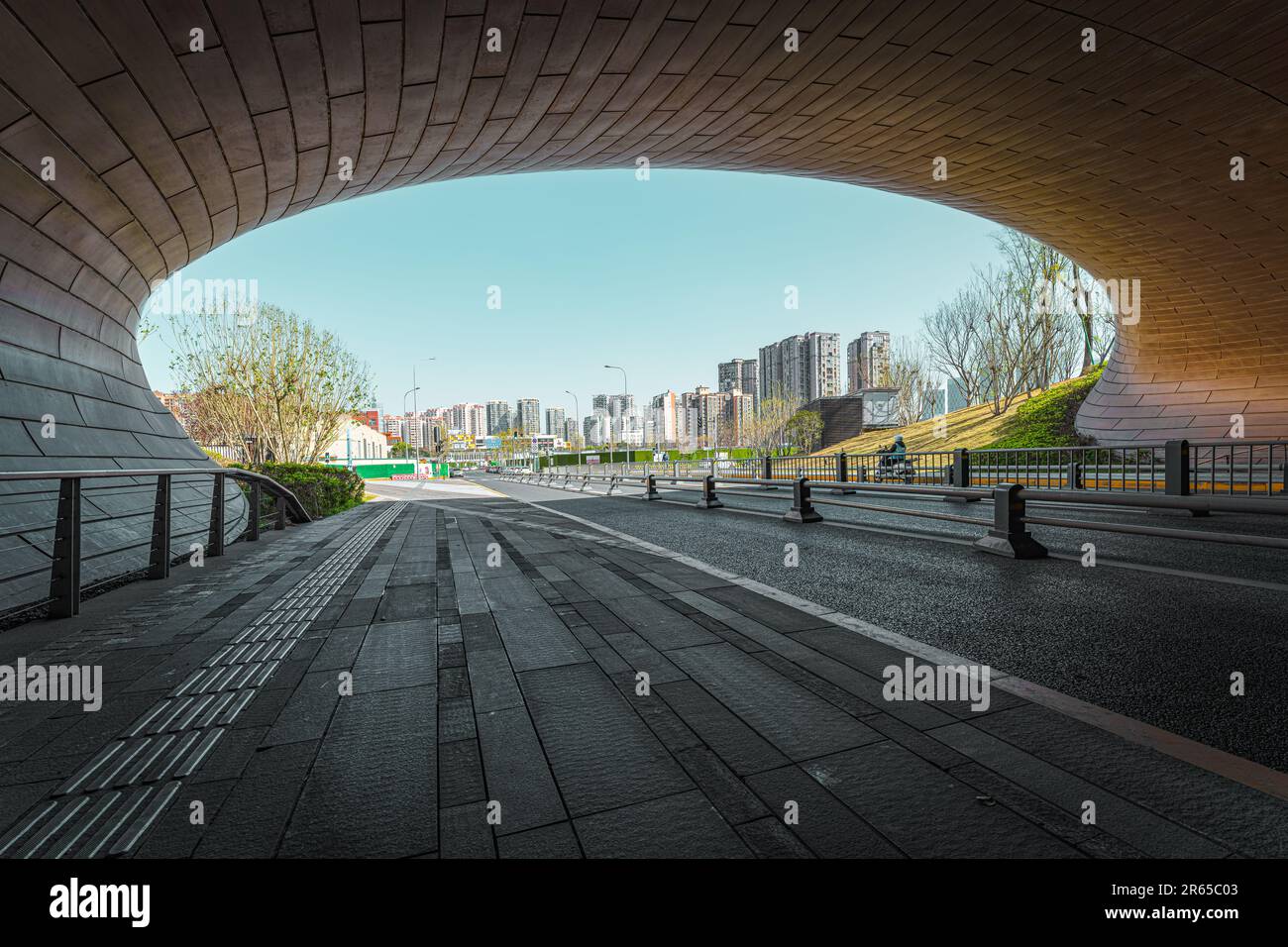 Walking through the wooden city tunnel Stock Photo - Alamy