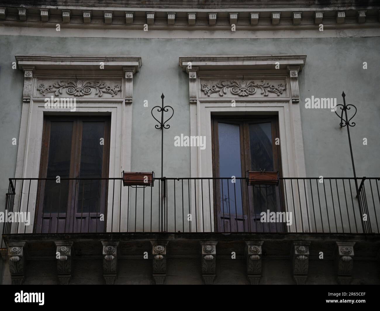 Old Baroque style building facade in Catania Sicily, Italy Stock Photo ...