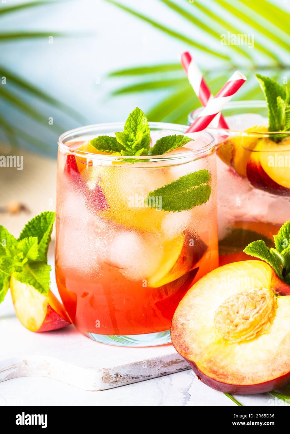 Peach cocktail, iced peach tea, fruit drink Stock Photo - Alamy