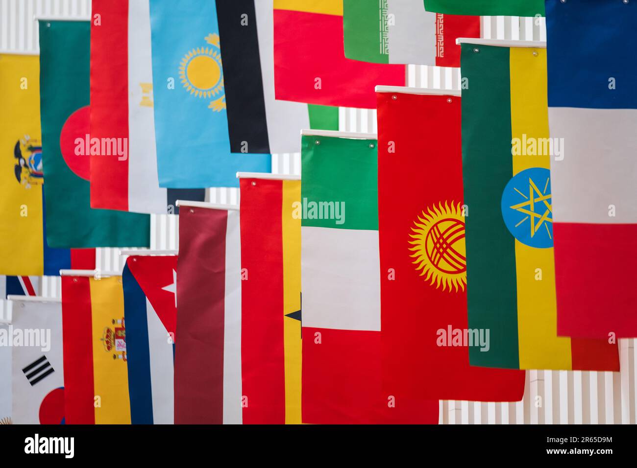 Full frame background of vibrant flags of countries from all over the ...
