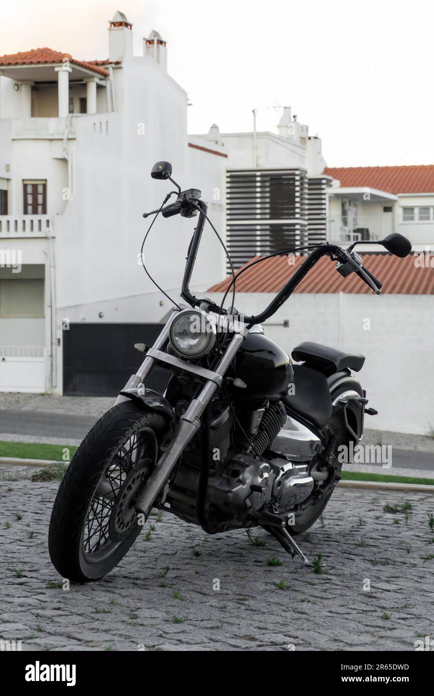 Black classic chopper motorcycle with chrome details. Front view Stock ...