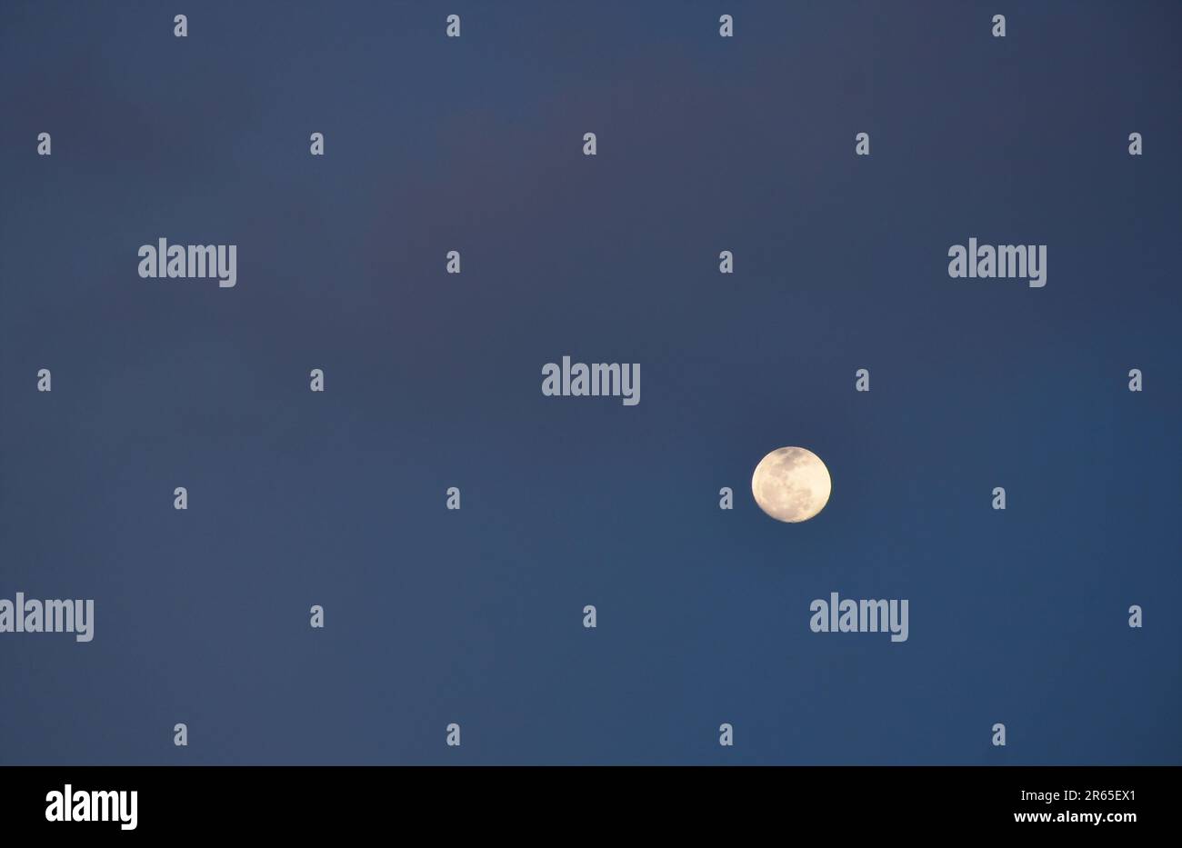 bright moon floating on sky in twilight background Stock Photo - Alamy