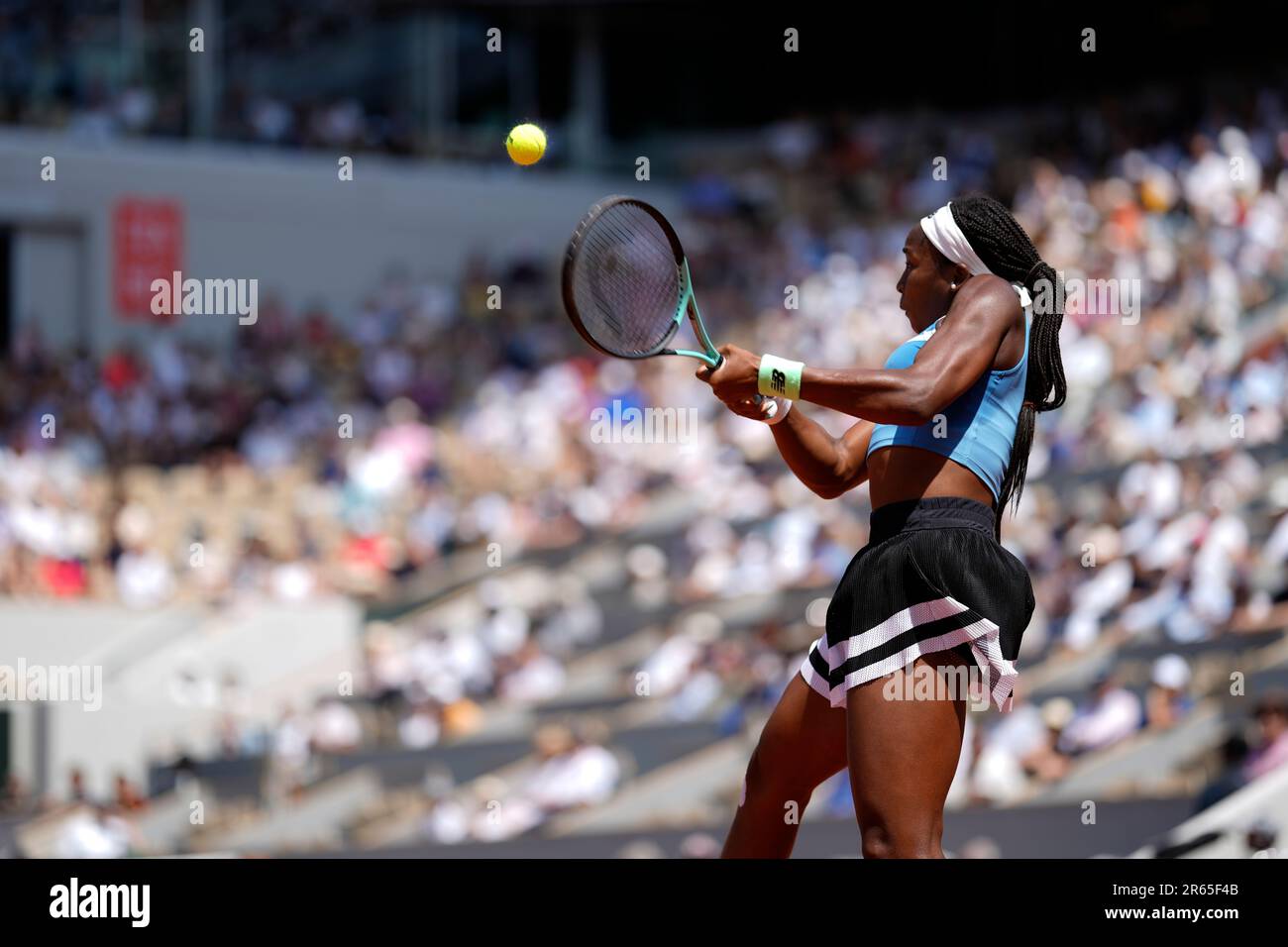 Coco Gauff of the U.S. plays a shot against Poland's Iga Swiatek during their quarterfinal match ...