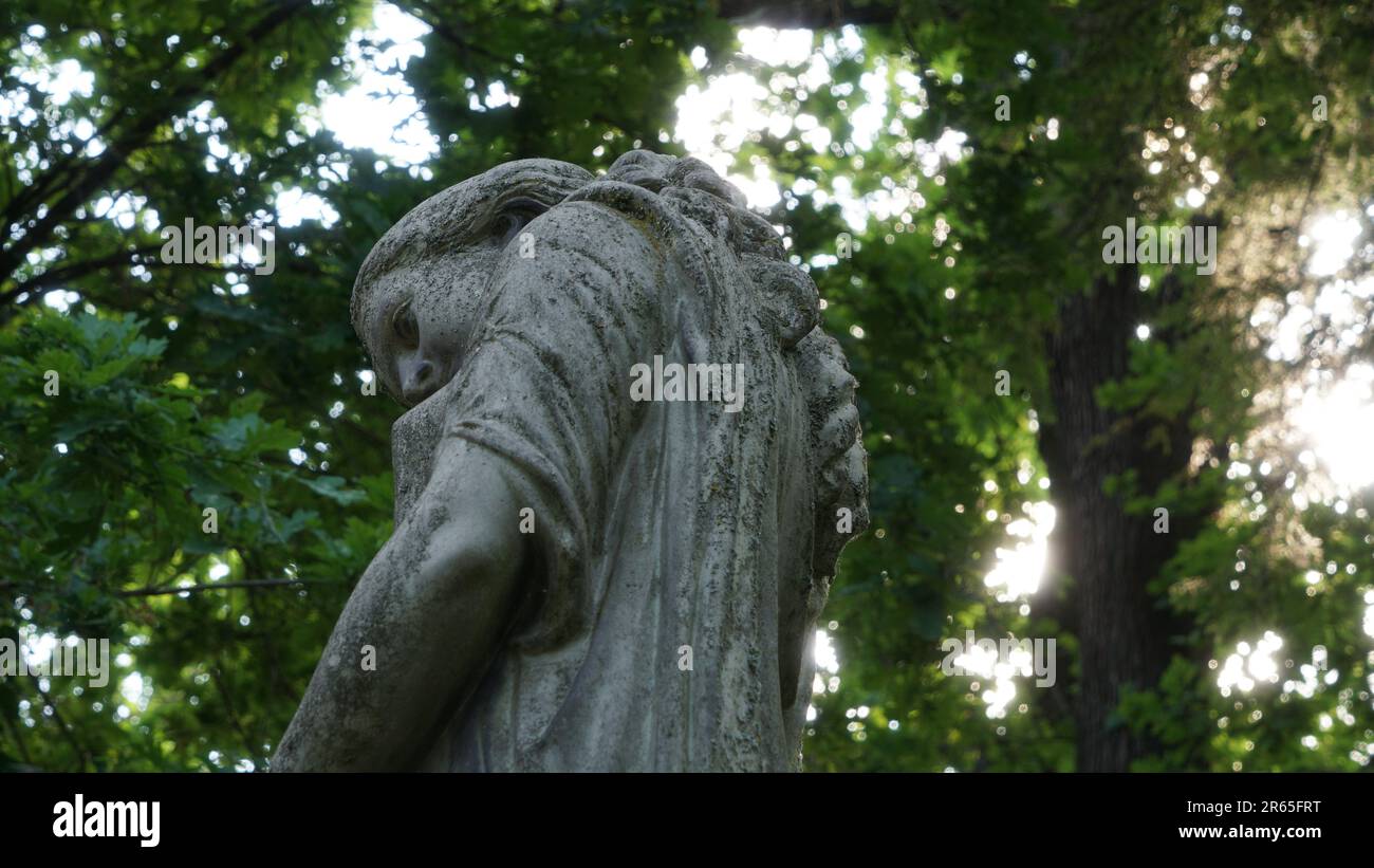 Sculpture of a beautiful woman in a graveyard / cemetery Stock Photo ...