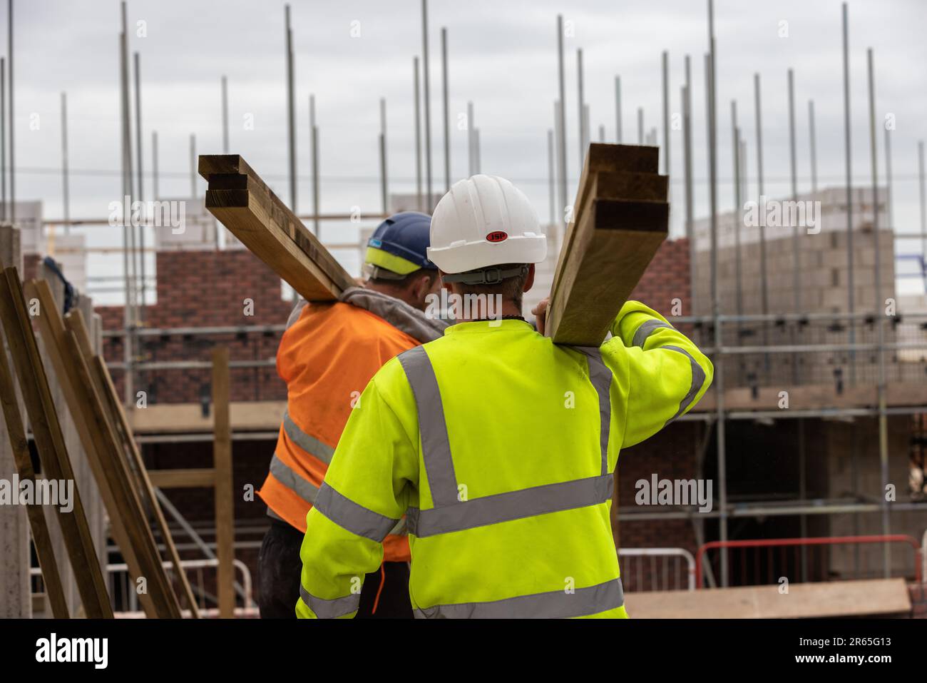 Construction workers on a housing development in England, United ...