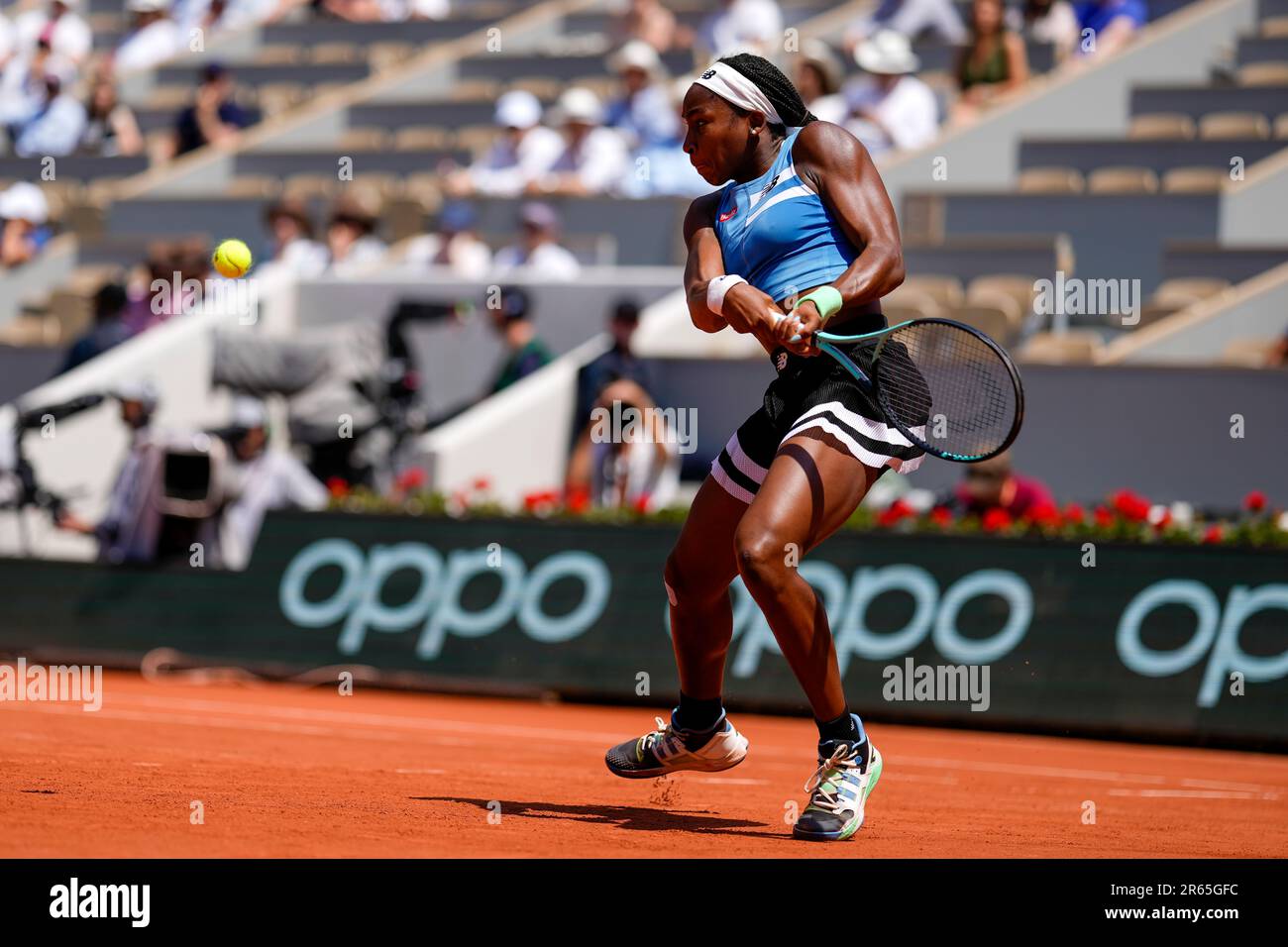 Coco Gauff of the U.S. plays a shot against Poland's Iga Swiatek during their quarterfinal match ...