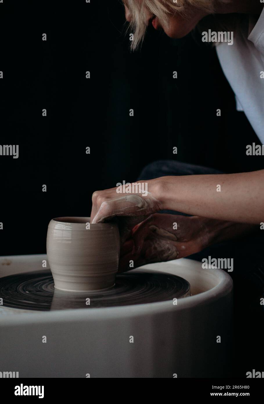 ceramist works behind a potter's wheel Stock Photo - Alamy