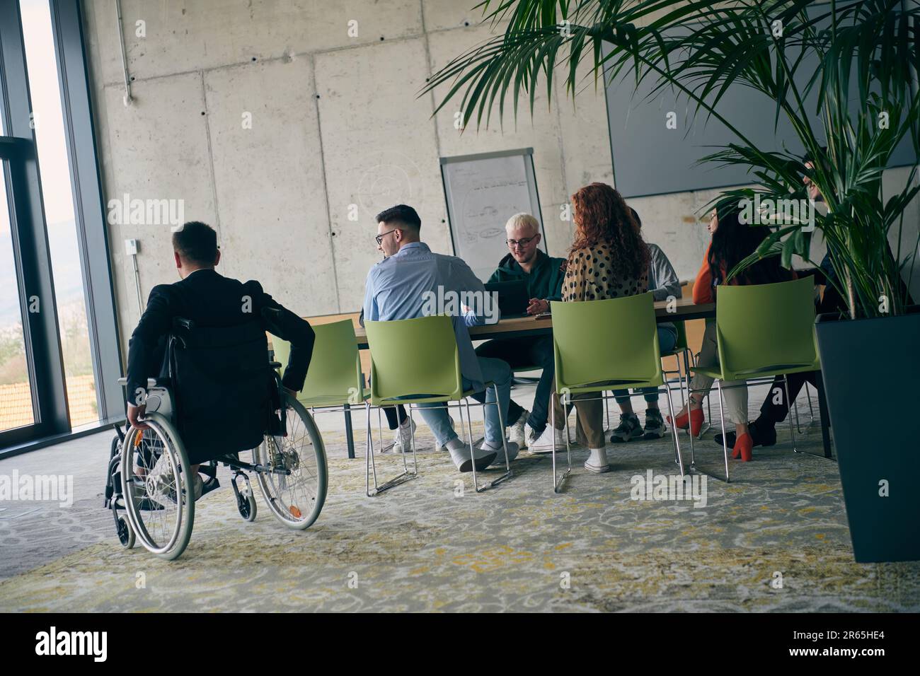 Diverse leadership team with disability hi-res stock photography and ...