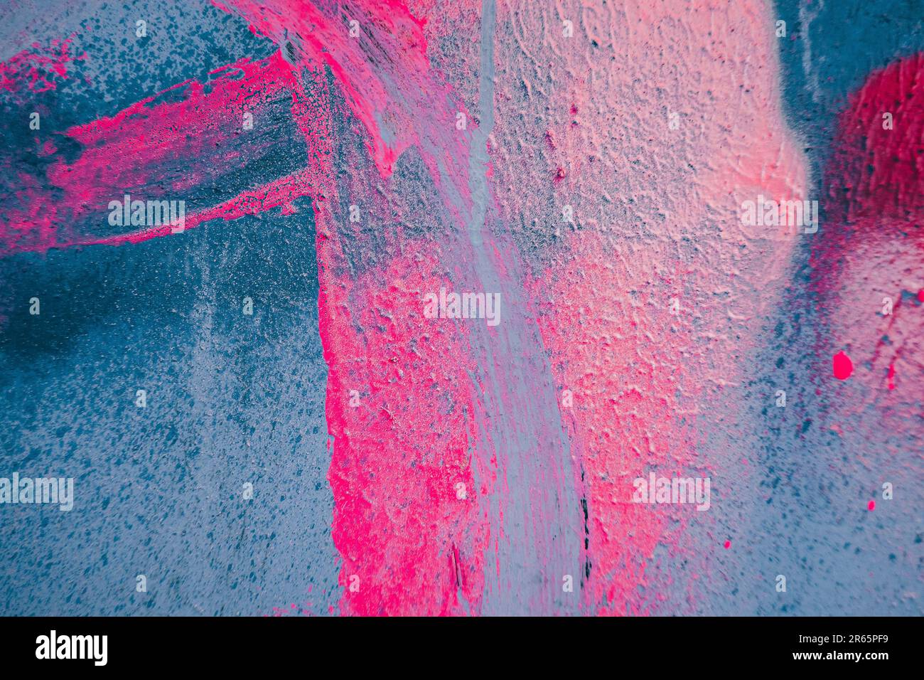 Messy paint strokes and smudges on an old painted wall background ...