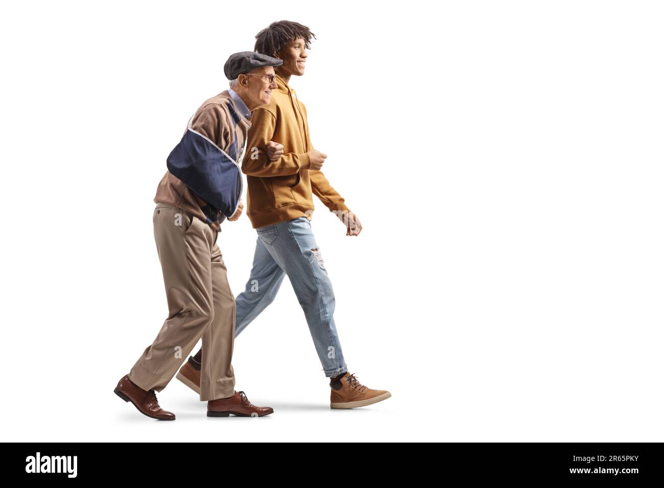African american guy walking with a senior man with an injured arm in a ...