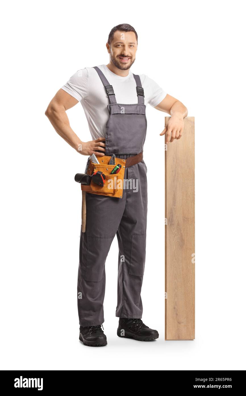 Craftsman posing with a wooden floor beam isolated on white background ...