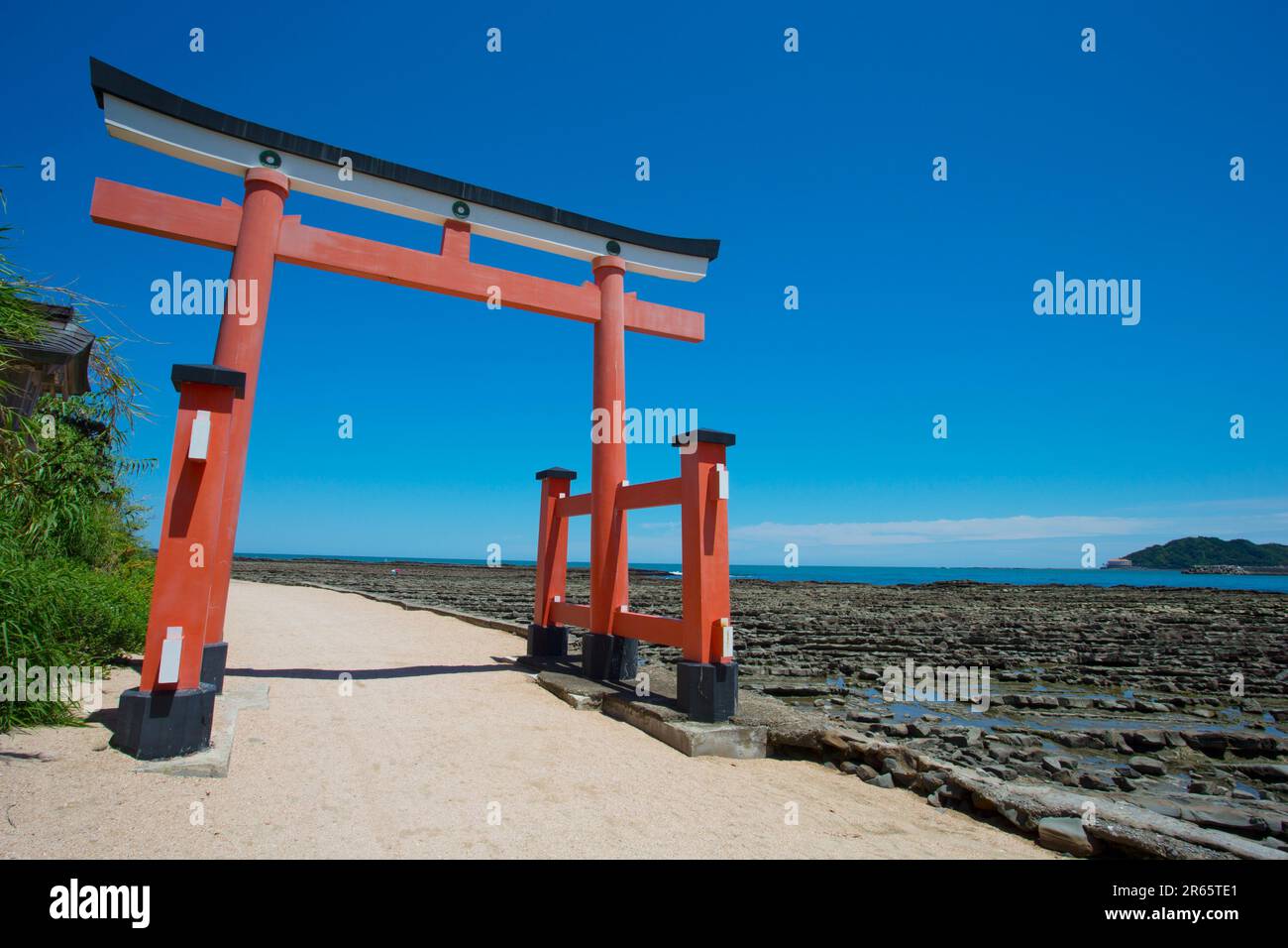 Torii (Gate) of Aoshima Shrine and Oni no washingiwa (Demon's washing rock Stock Photo - Alamy