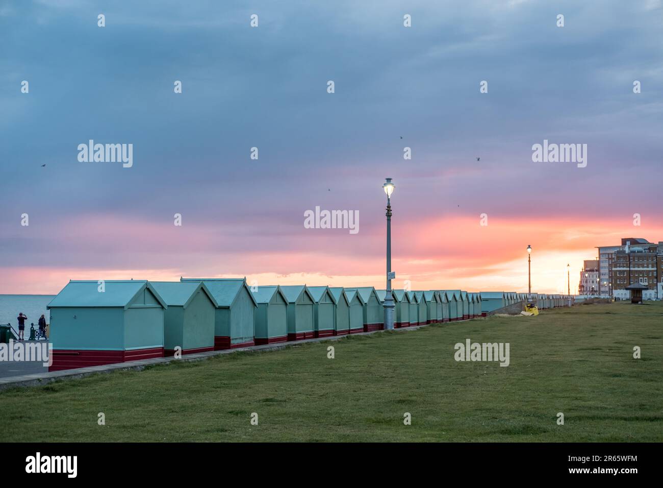 Colorful Beach Huts during sunset at Brighton and Hove, England Stock ...