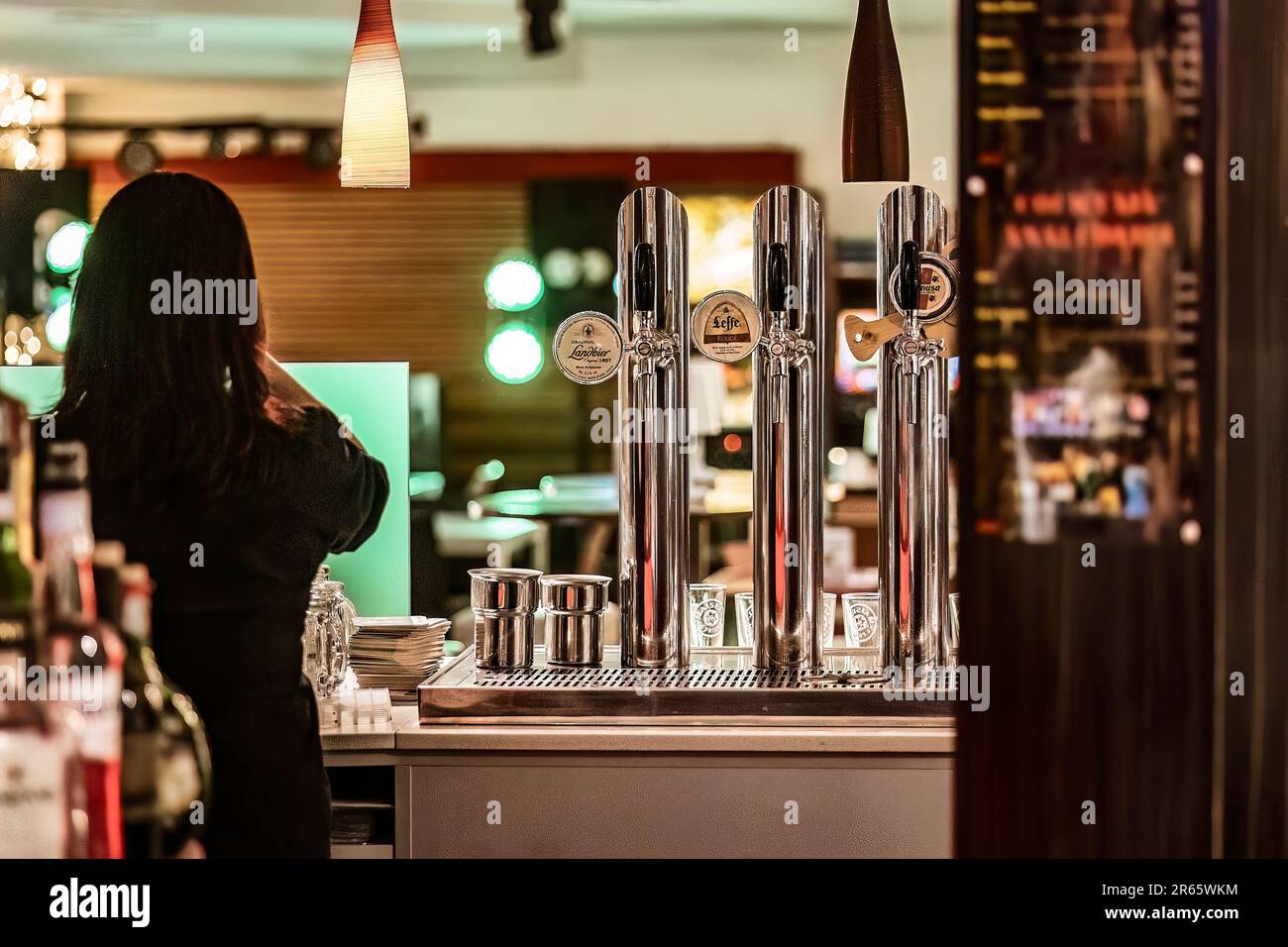 Masi, Italy 7 june 2023: A photo showcasing a bar counter with multiple beer taps ready to pour ...